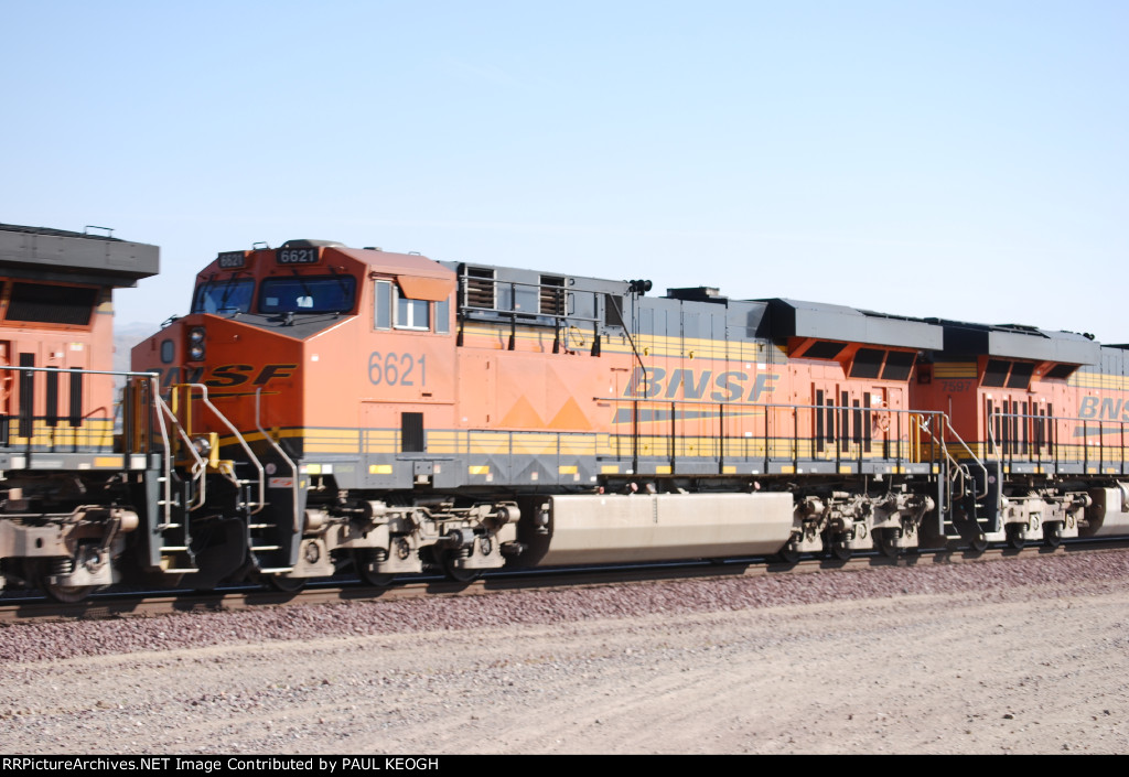BNSF 6621 #3 unit behind BNSF 6612 rolls into the BNSF Barstow yard.
